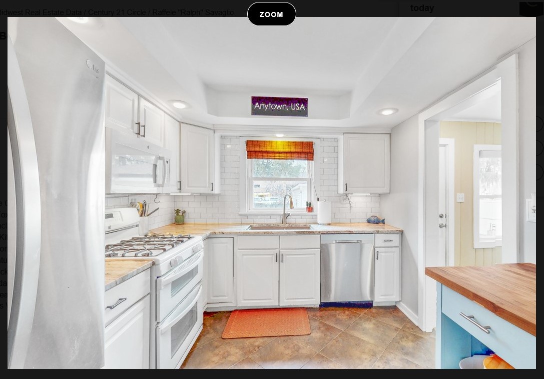 A home with an “Anytown, USA” sign | Legally Sociable
